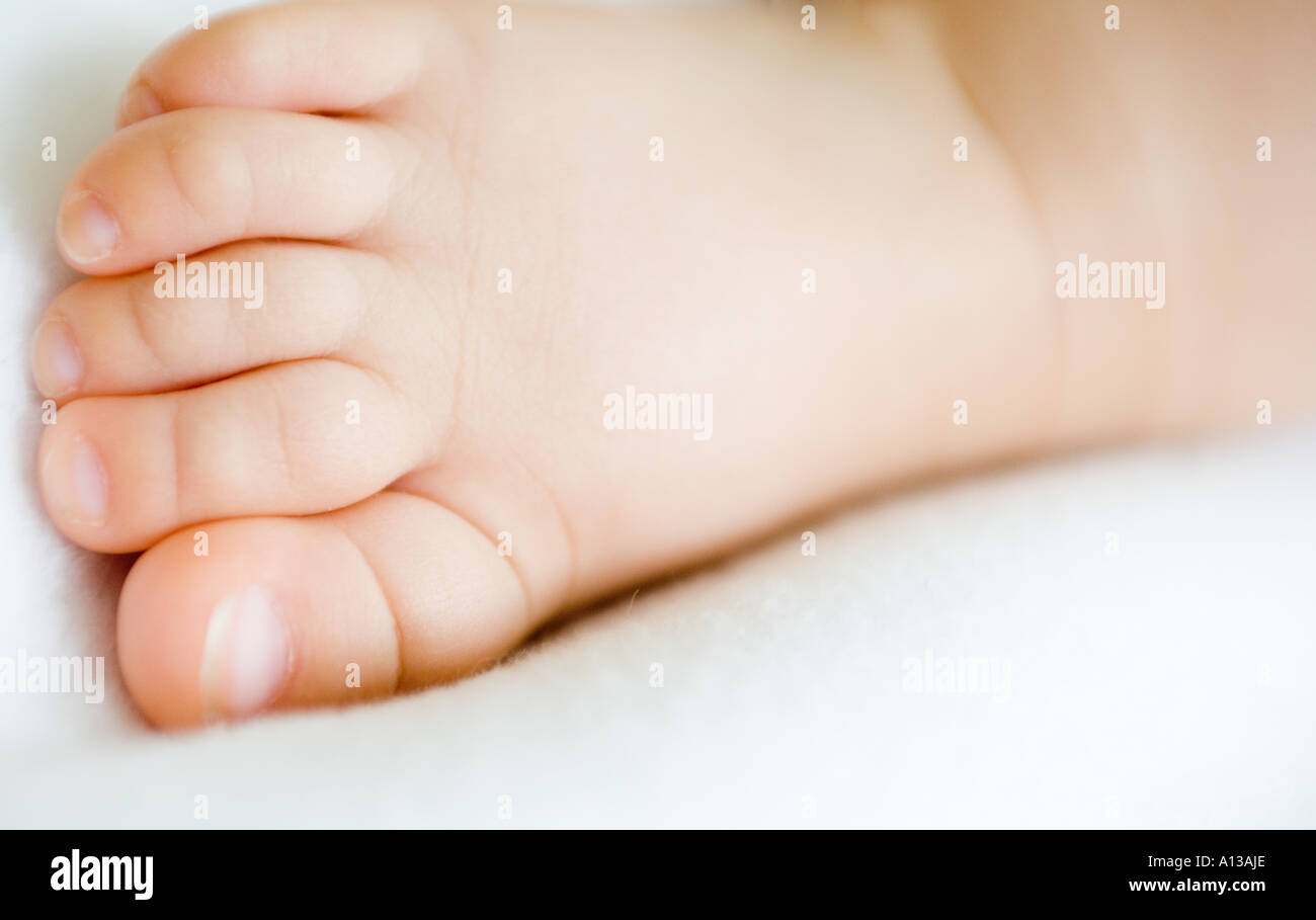7 month old sleeping baby's foot Stock Photo - Alamy