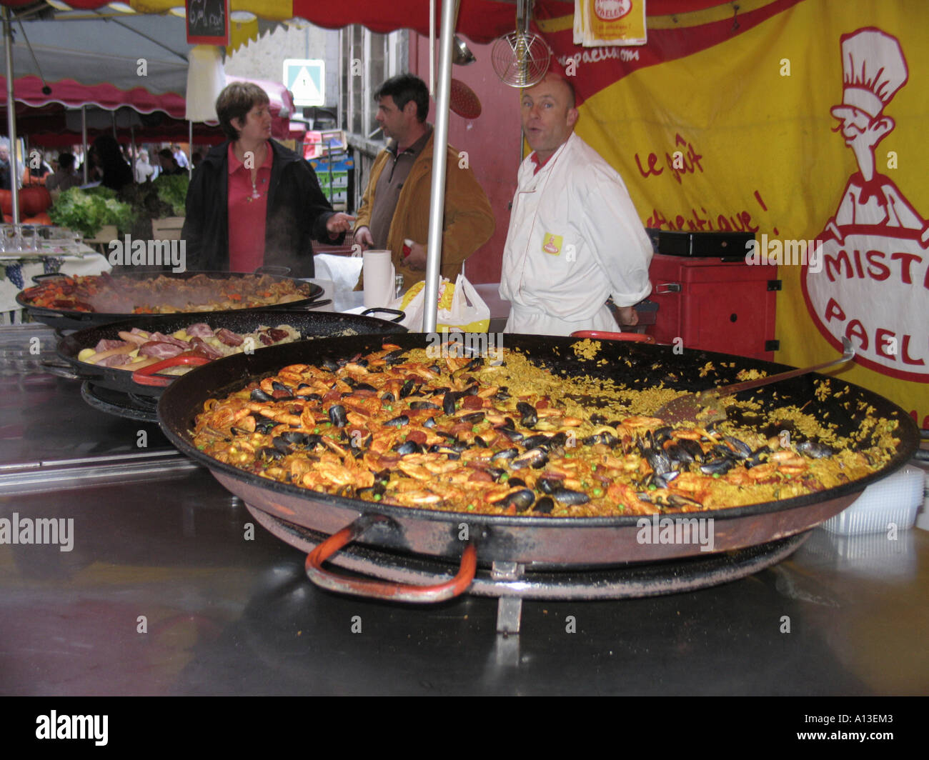 Large pan of paella in street market Vannes Brittany France french ...