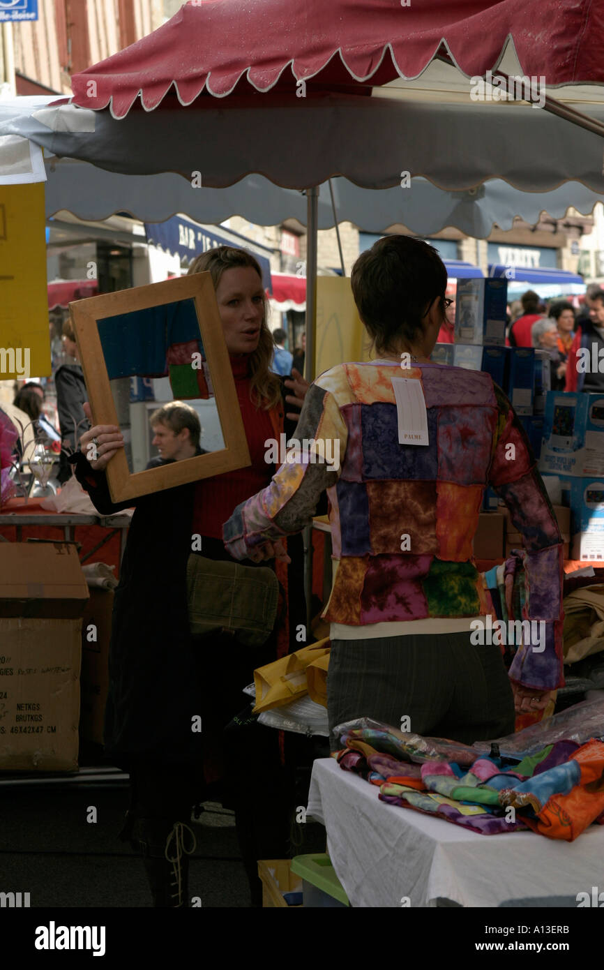 Women at clothing stall in Vannes market Stock Photo - Alamy