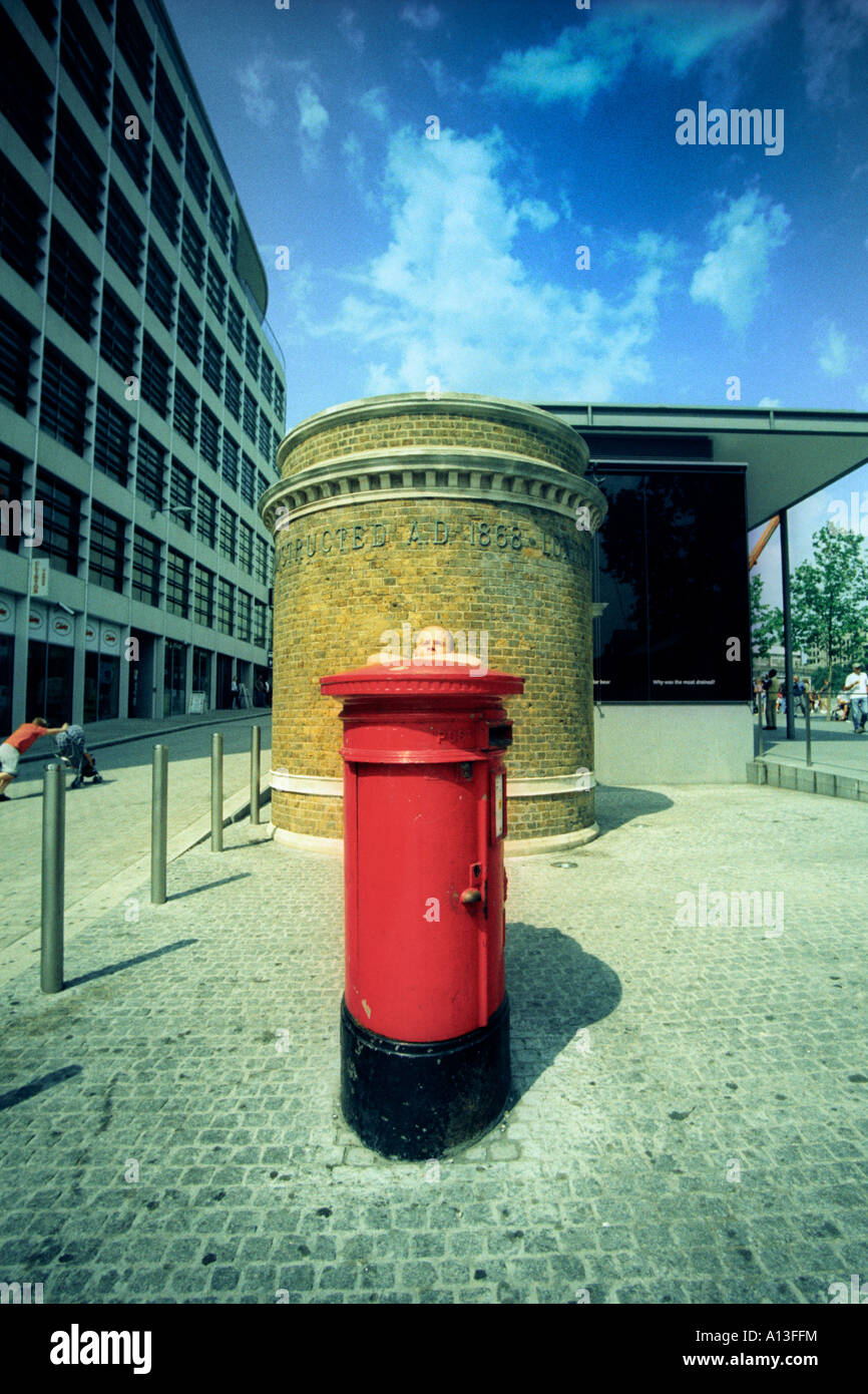 Man Hiding Behind Post Box, London, UK Stock Photo - Alamy