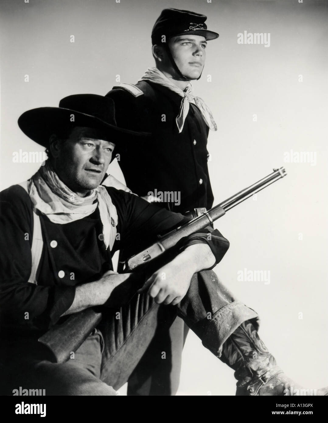 The Searchers Year 1956 Director John Ford John Wayne Patrick Wayne Shooting picture Stock Photo ...