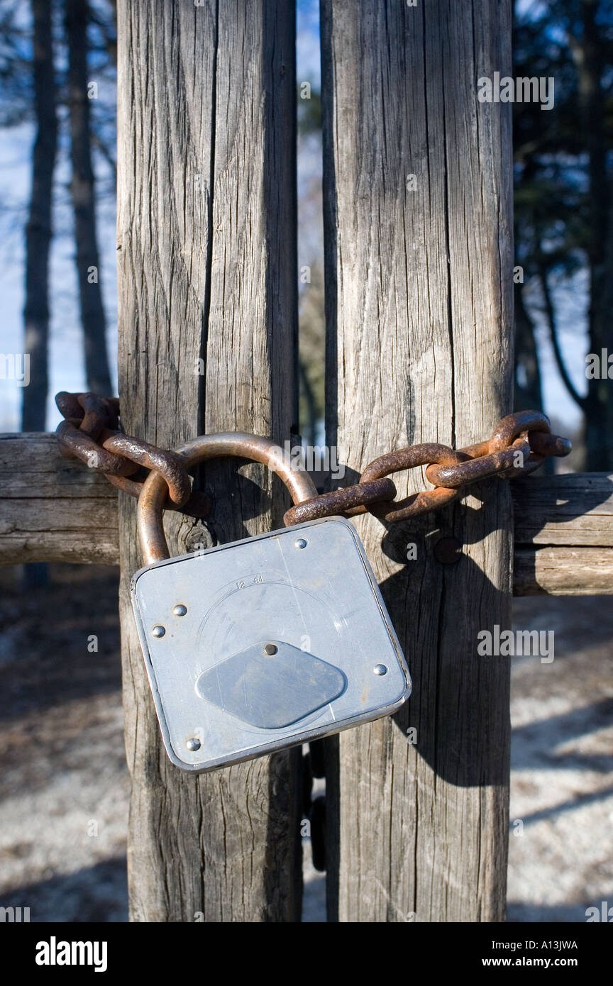 wooden gate locked Stock Photo - Alamy