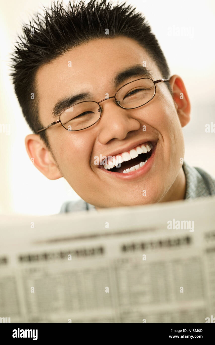 Newspaper reader asian man reading hi-res stock photography and images ...