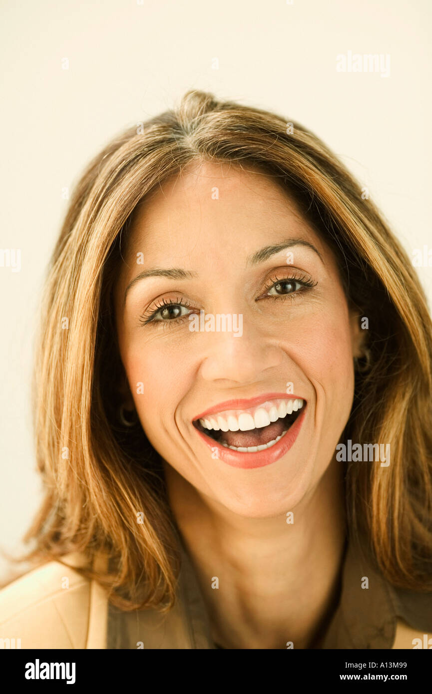 Mature woman laughing Stock Photo - Alamy