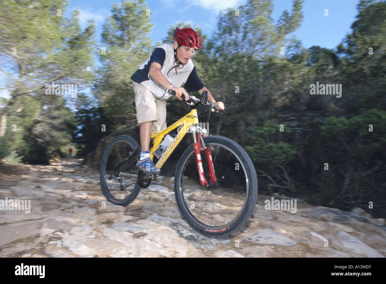 Young Boy on Mountain Bike Stock Photo - Alamy