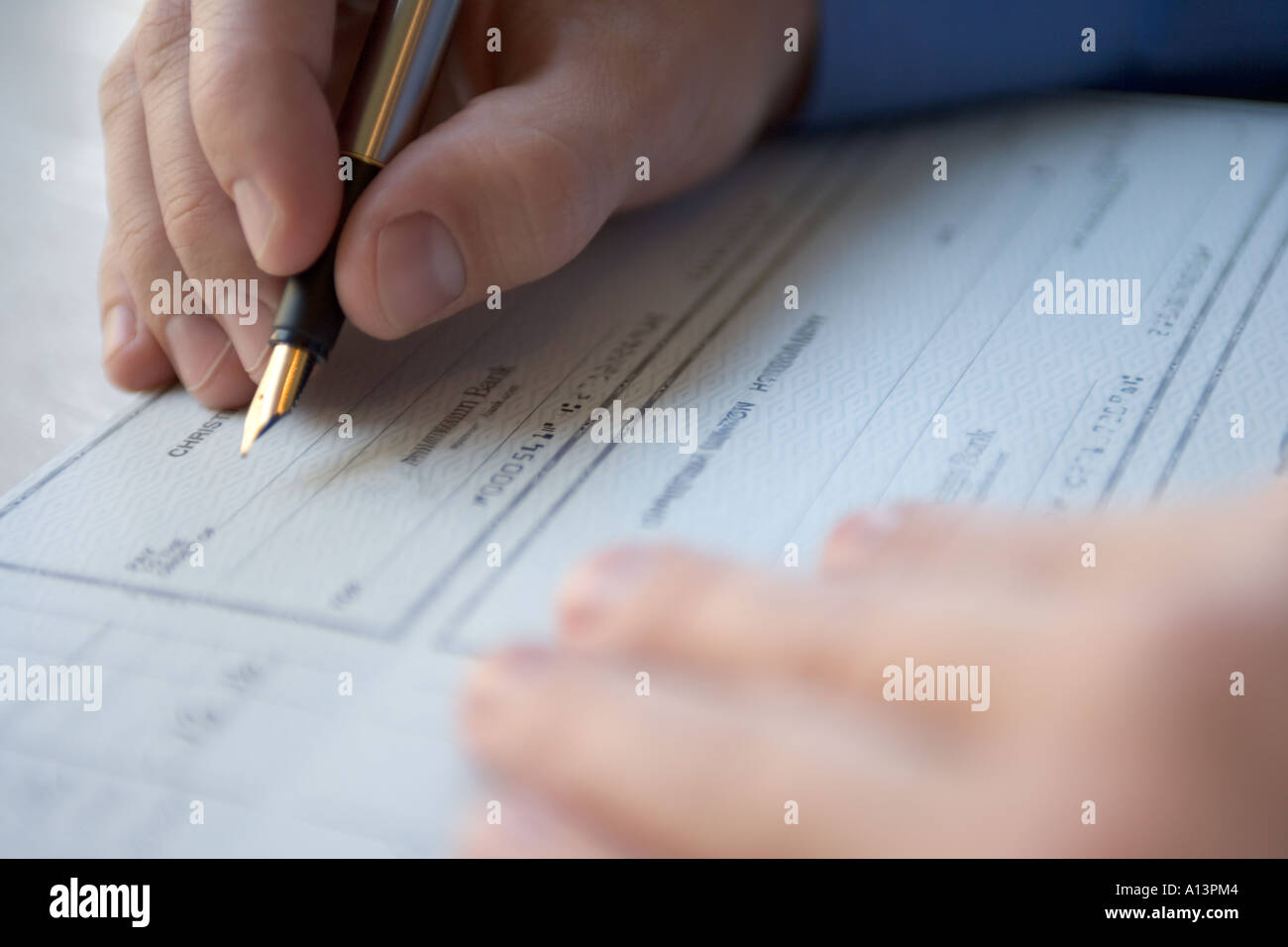 Writing a check hi-res stock photography and images - Alamy