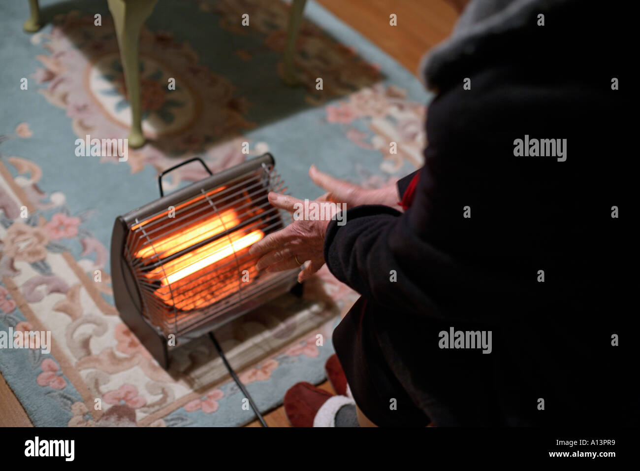 Cold old lady fire hi-res stock photography and images - Alamy
