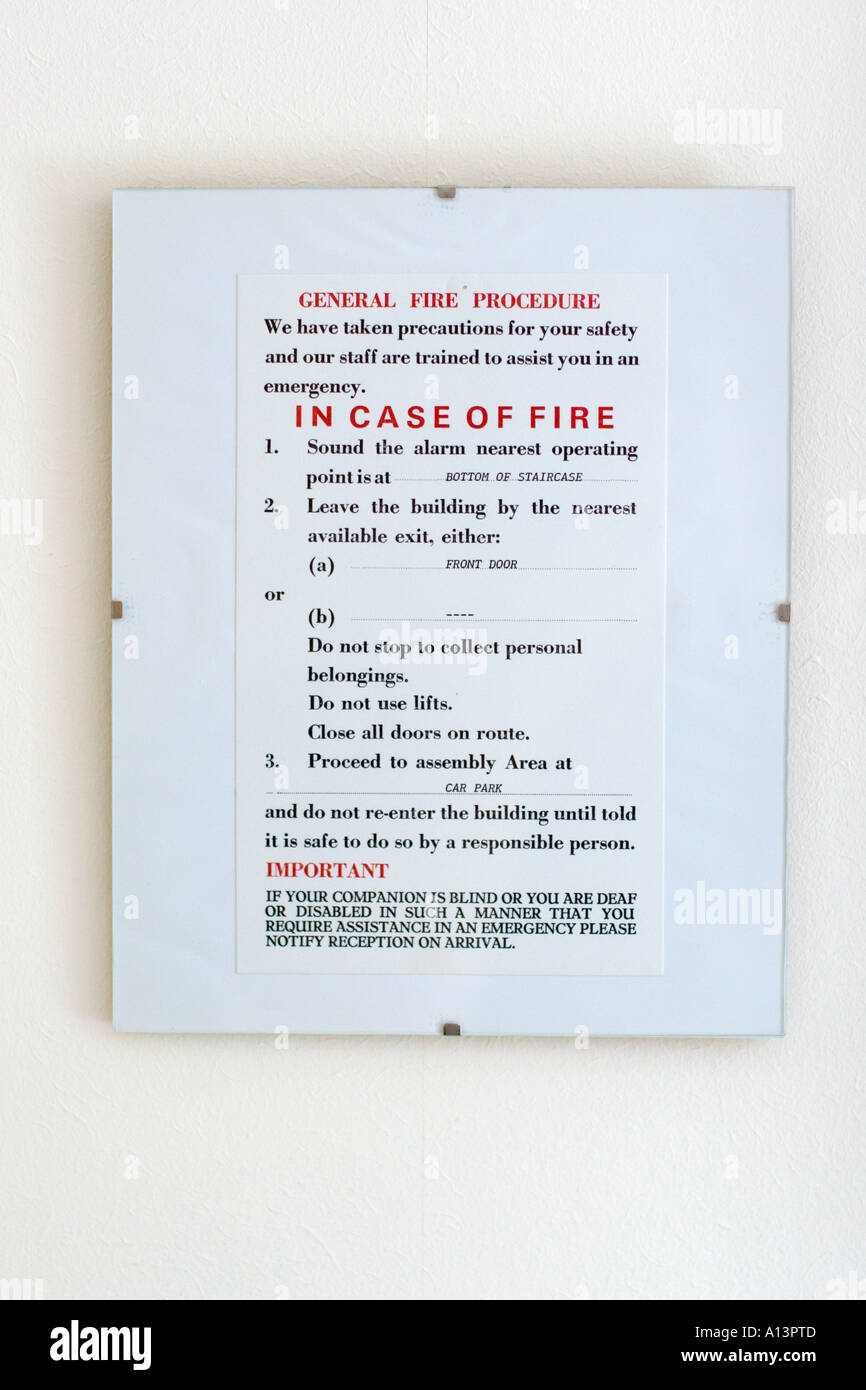 In case of fire notice hangs on wall in English hotel Stock Photo - Alamy
