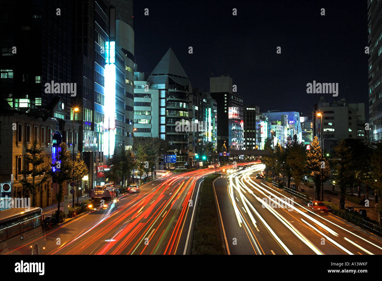 Shinjuku, Tokyo, Japan. A busy inner city road with blurred vehicle ...