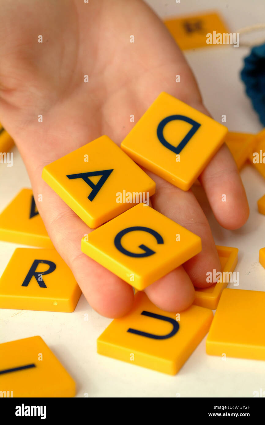 Hand holding letter from alphabet hi-res stock photography and images ...