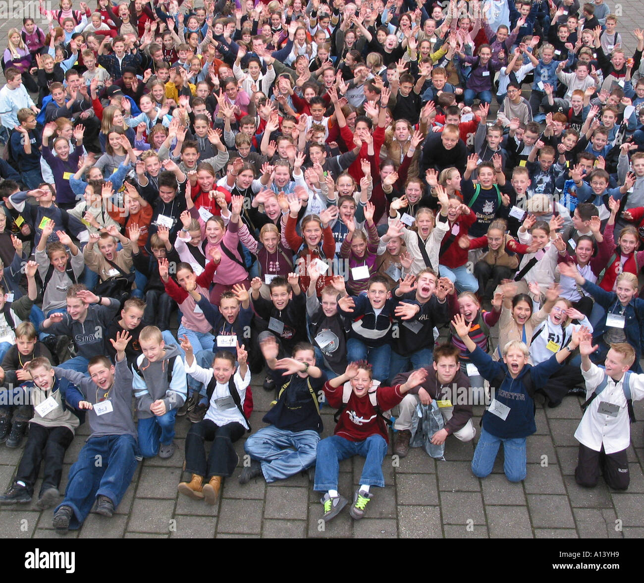 Audience applauding outdoors children hi-res stock photography and ...