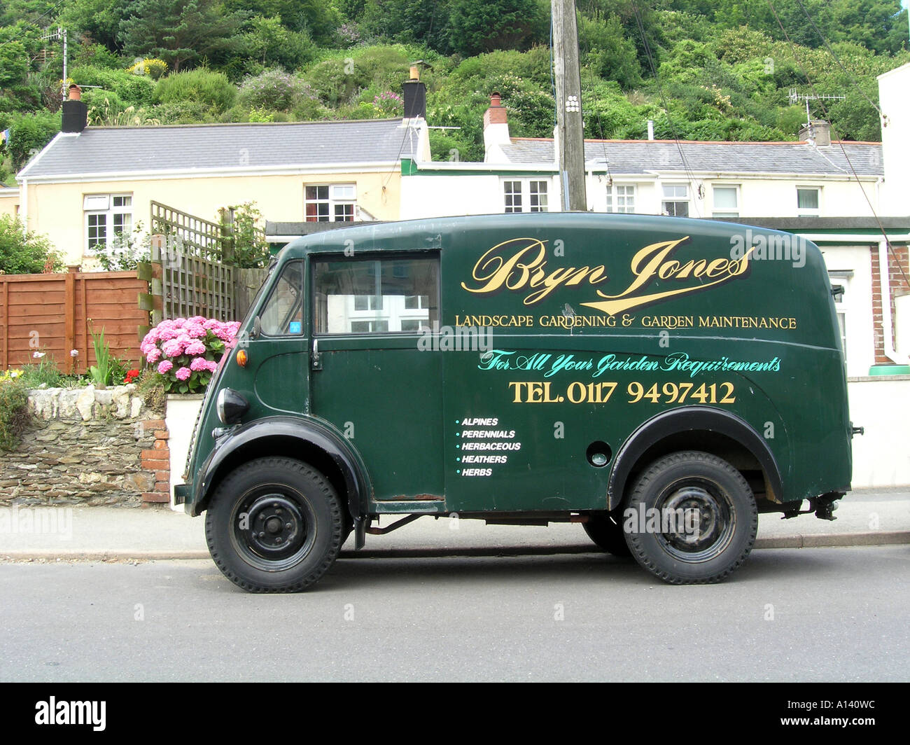 side view of fifties Morris J type Van by roadside Stock Photo - Alamy