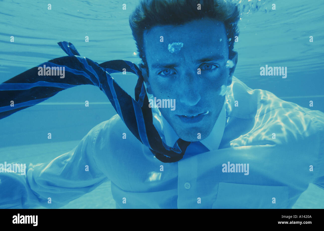 Businessman underwater hi-res stock photography and images - Alamy