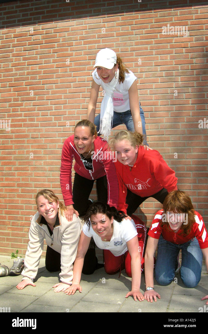 human pyramid of teenage girls Stock Photo - Alamy