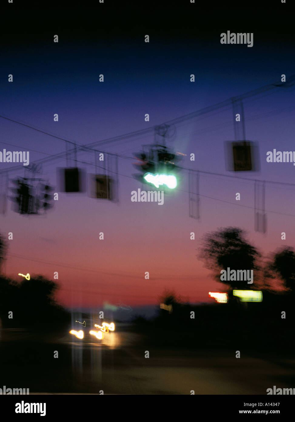 A traffic intersection at night Stock Photo - Alamy