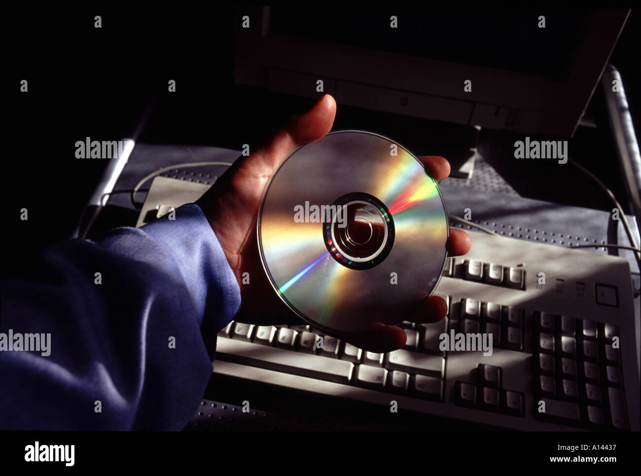 Hand holding cd hi-res stock photography and images - Alamy