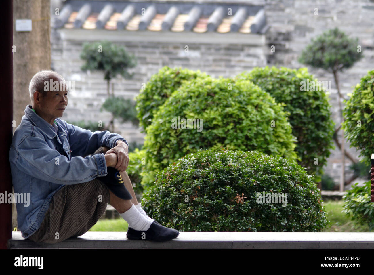 Elderly man, Kowloon Walled City Park, Kowloon City, Hong Kong SAR ...