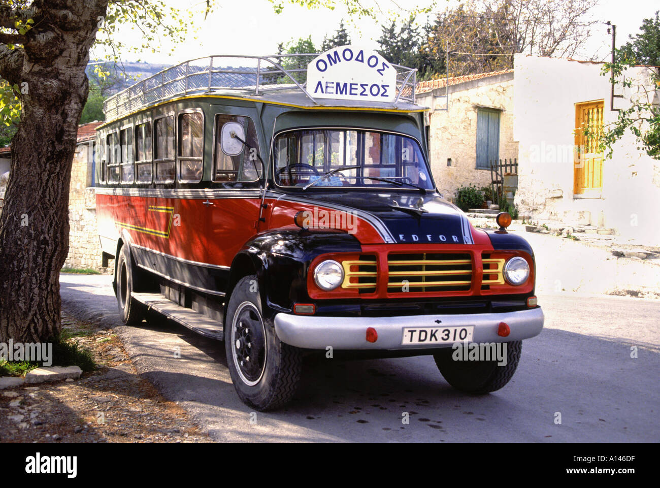 Brightly painted passenger bus Cyprus Stock Photo - Alamy