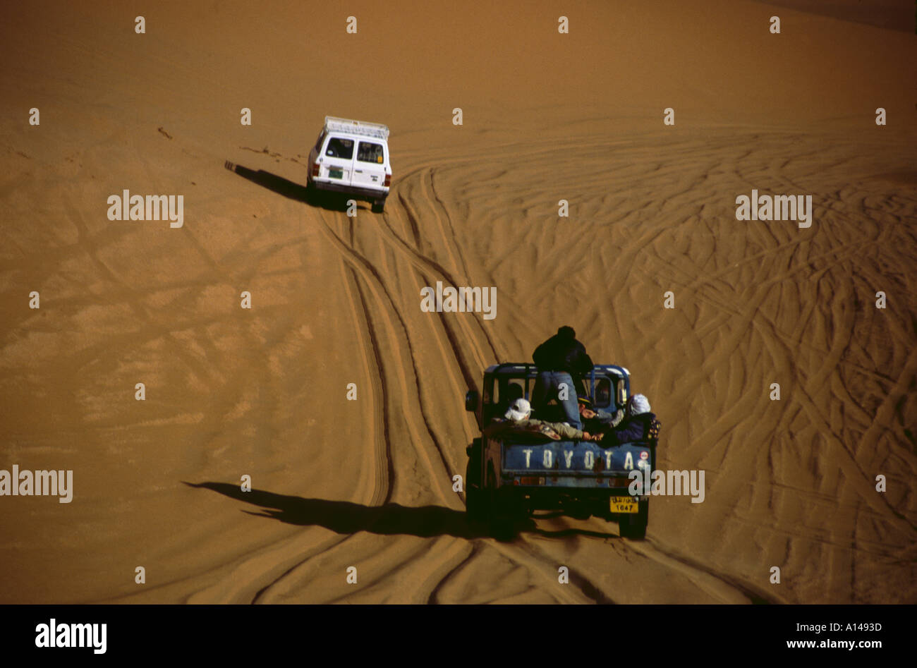 jeeps driving desert Sahara Libya dirt road desert road expedition arid ...