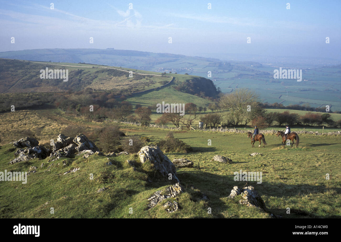 Horse riders on Wavering Down near Crook Peak in the Mendip Hills ...