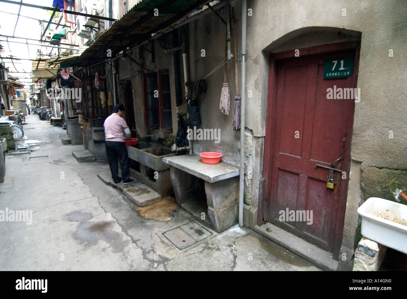 Street scene in a shikumen, Shanghai’s typical traditional ...