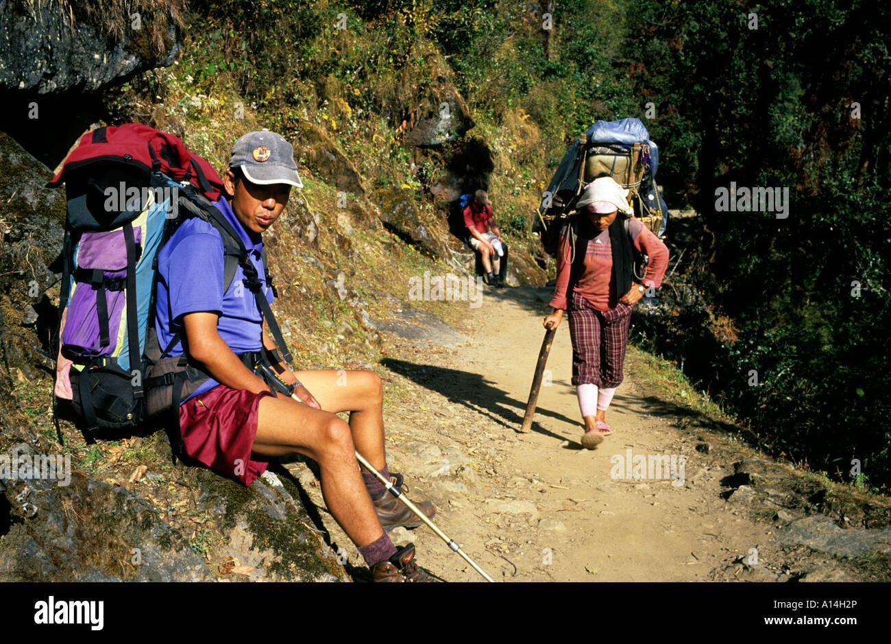 Porter carrying his load on Mera Peak, Himalayas, Nepal Stock Photo - Alamy