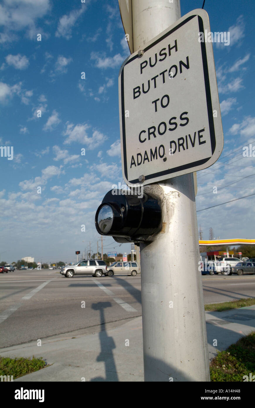 Instructions and directions on how to cross the street at a busy ...