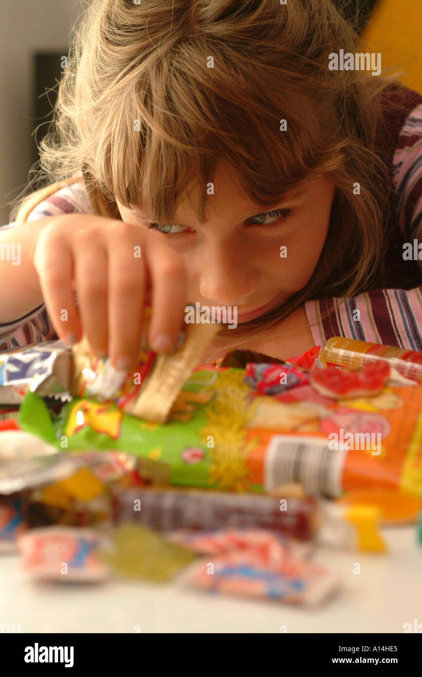 child eats sweets Stock Photo - Alamy