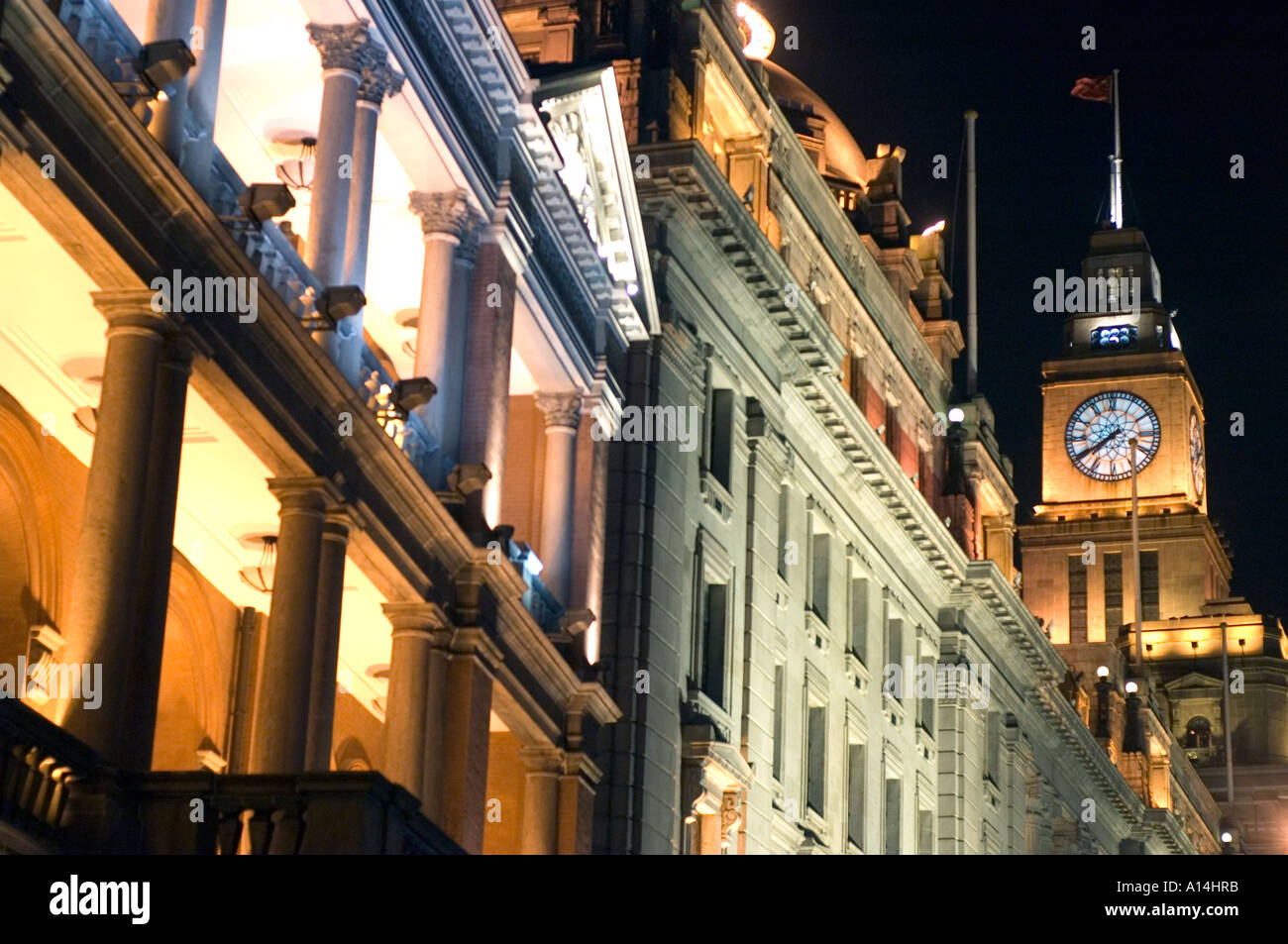 Illuminated art-deco buildings on the Bund riverside in Shanghai, China ...