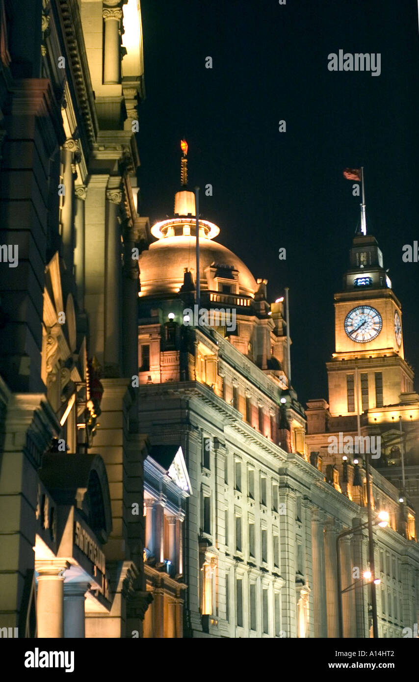 Illuminated art-deco buildings on the Bund riverside in Shanghai, China ...
