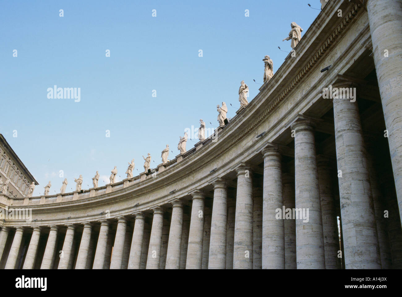 Columns and statues in St Peters Square Berninis Square Piazza Saint ...