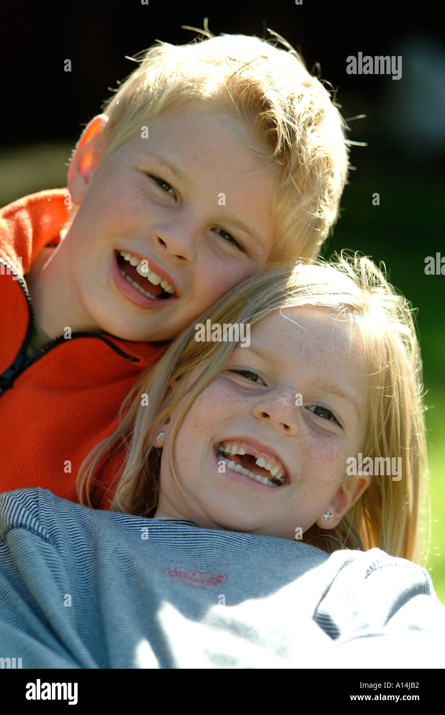 sibling brother and sister Stock Photo - Alamy