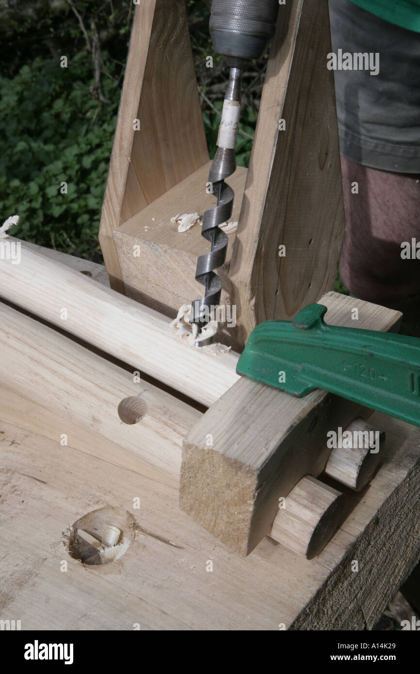 Greenwood Chair Making drilling the back legs on the bending jig Stock ...