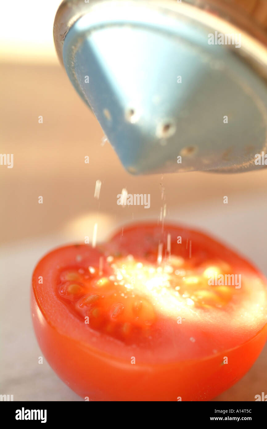 salt on tomato Stock Photo - Alamy