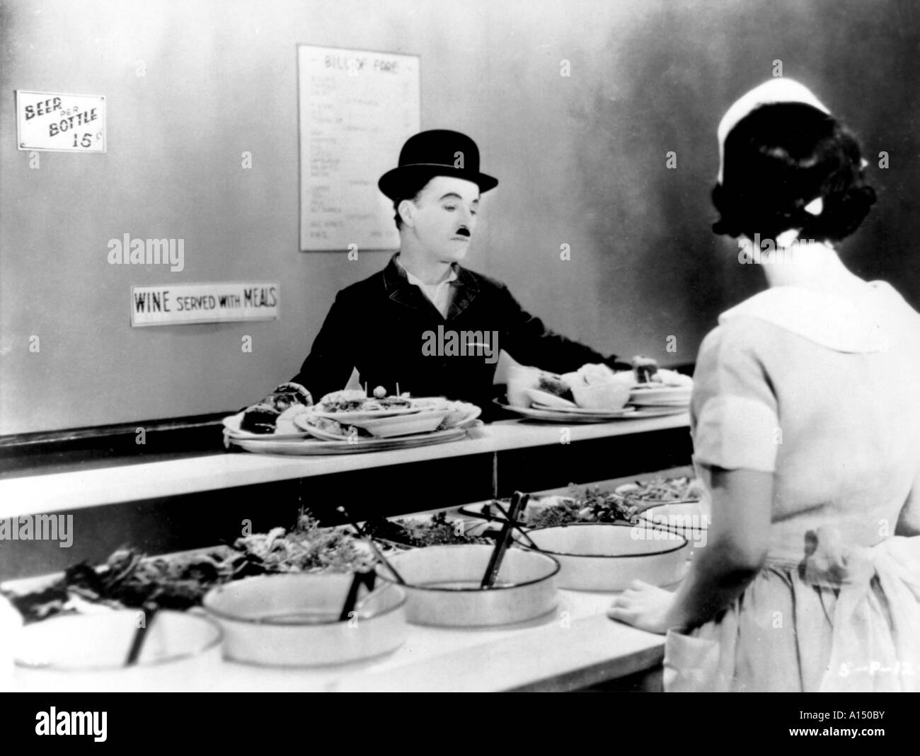 Charles chaplin modern times Black and White Stock Photos & Images - Alamy