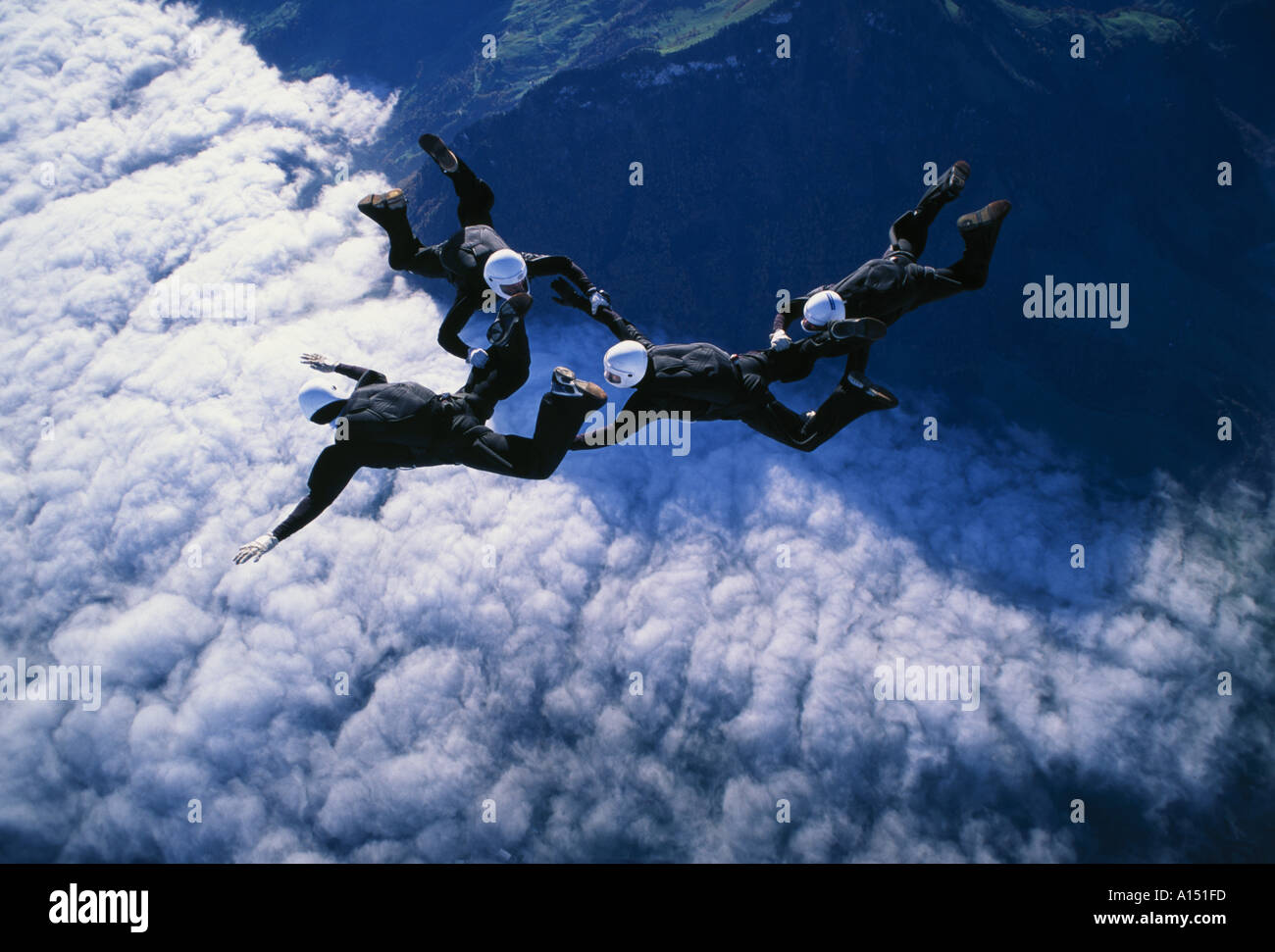 Zebra Freefall Team above the clouds Stock Photo - Alamy