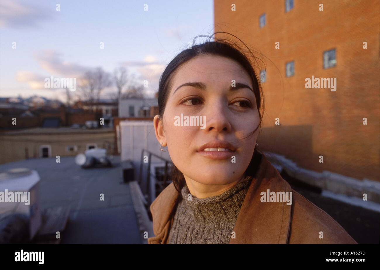 portrait of girl on rooftop Stock Photo - Alamy