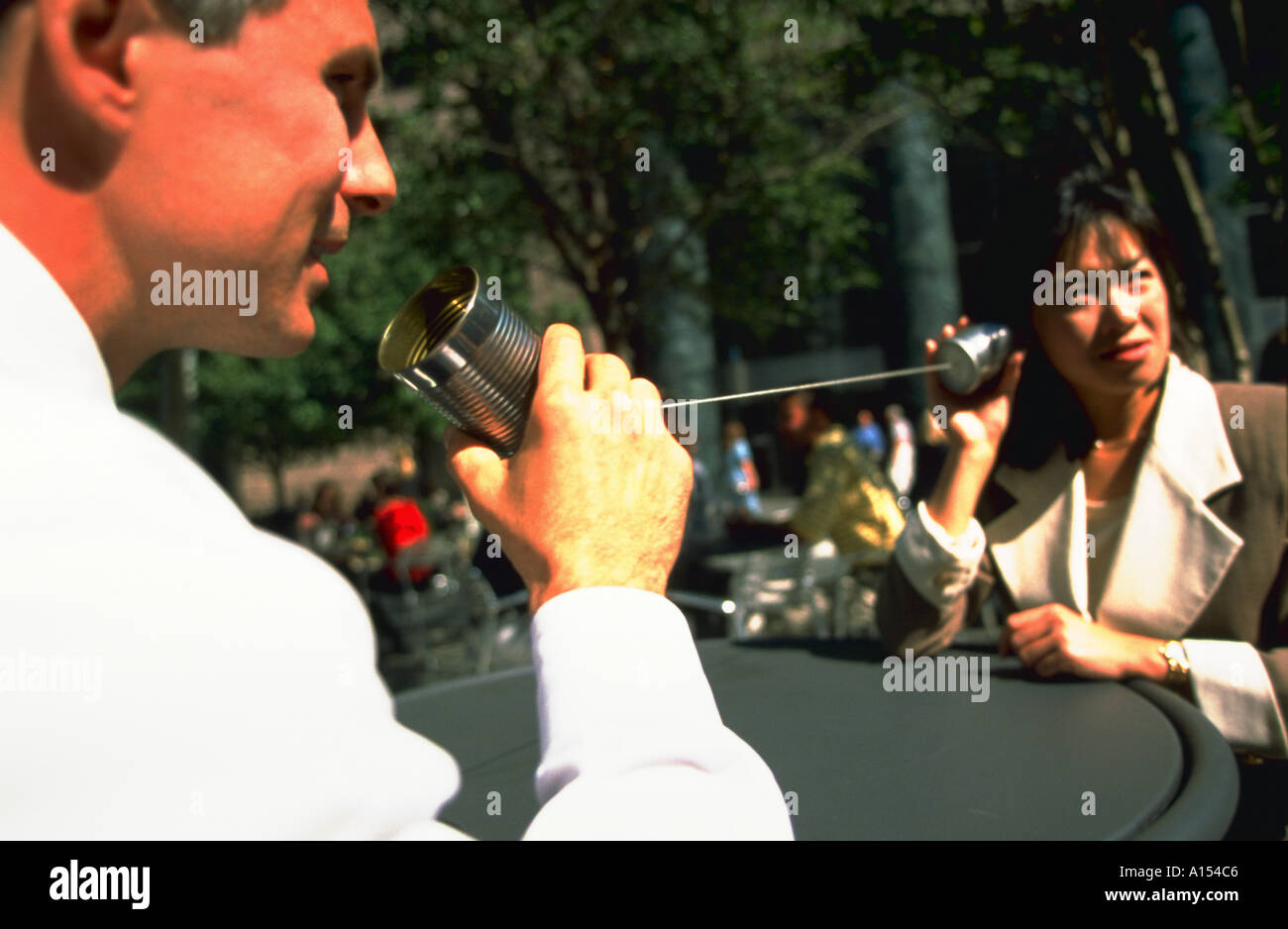 Communication woman cans hi-res stock photography and images - Alamy