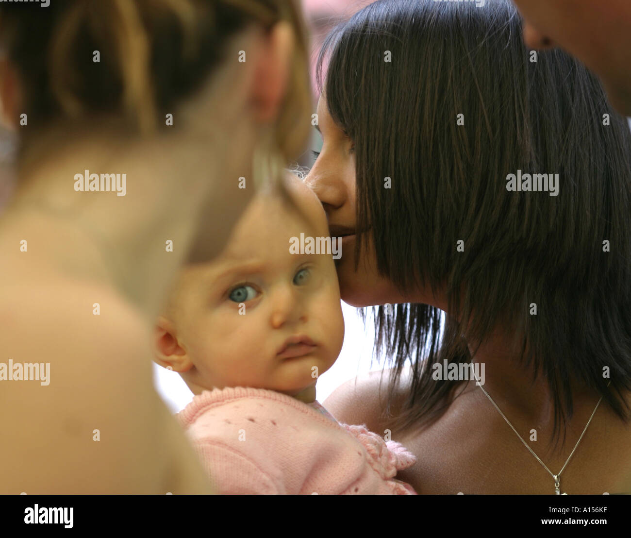 Mother and child share a quiet moment during a family gathering Stock ...