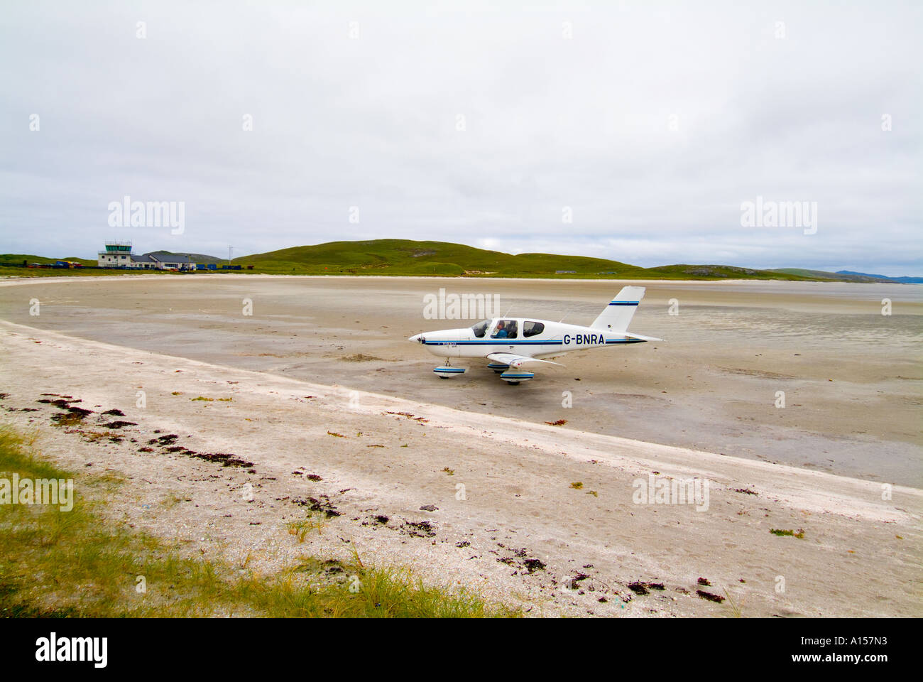 A light aircraft at Barra Airport Western Isles Scotland Stock Photo ...