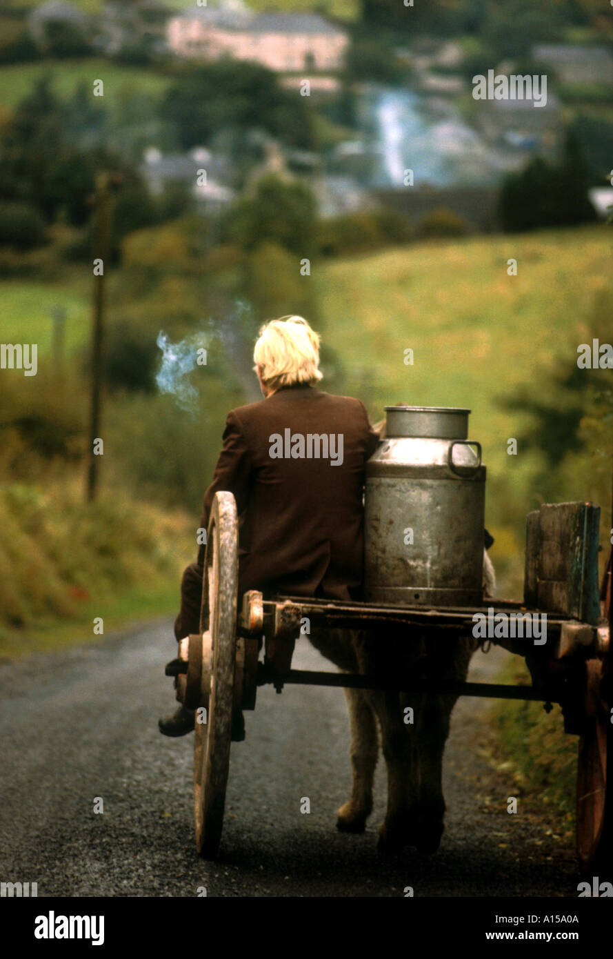 Figure riding cart with milk churn Arigna Shannon River Co Leitrim ...