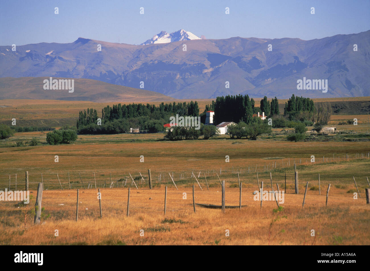 Ranch at Villa Castillo farmland and mountains behind in Patagonia ...