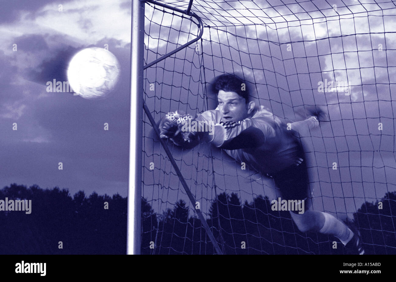 Soccer goalkeeper hitting ball hi-res stock photography and images - Alamy