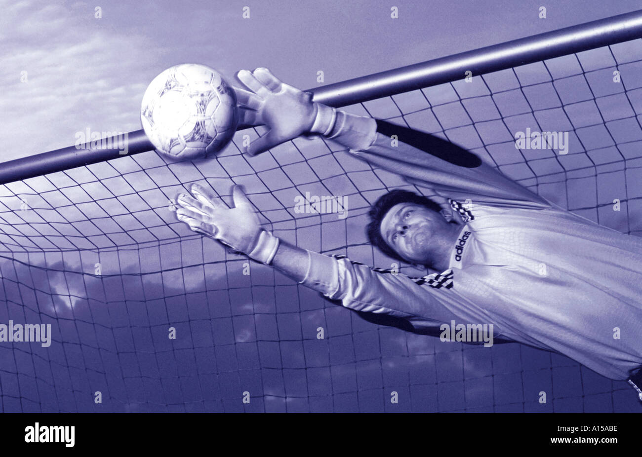 soccer goalkeeper catching ball in midair Stock Photo - Alamy