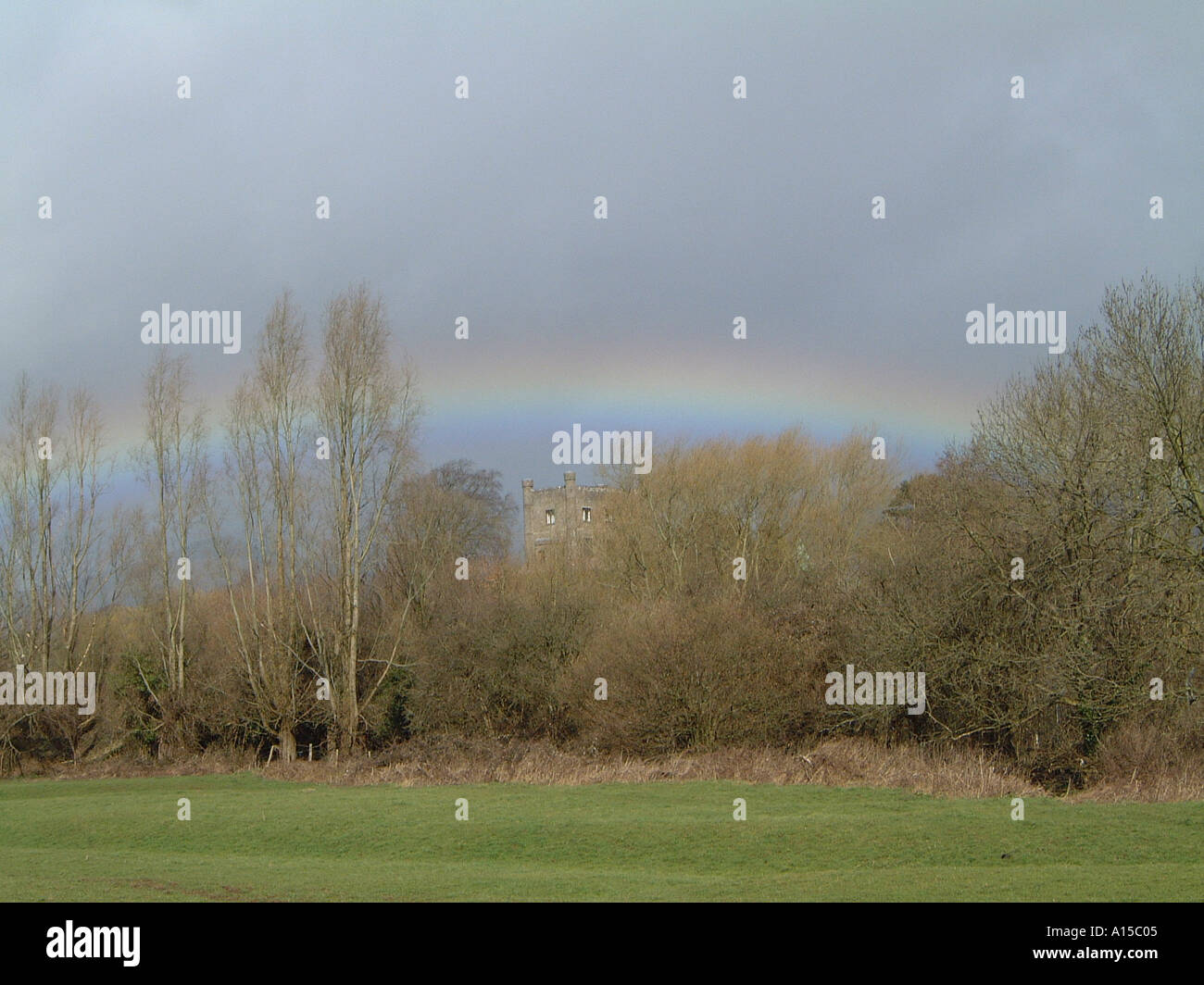 Rainbow over castle in Wales Stock Photo - Alamy
