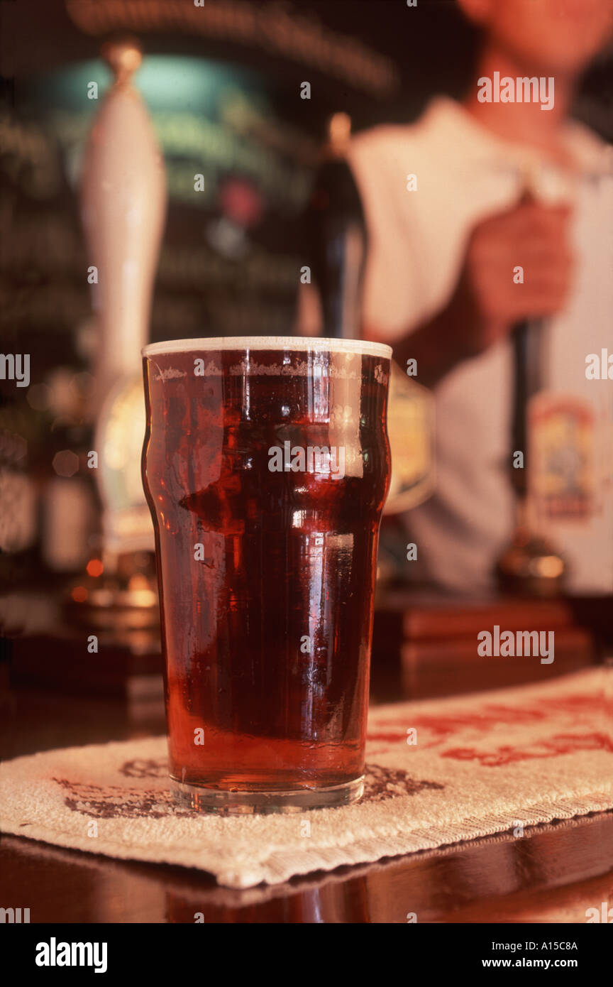 Pint of English Beer on Bar Top Stock Photo - Alamy