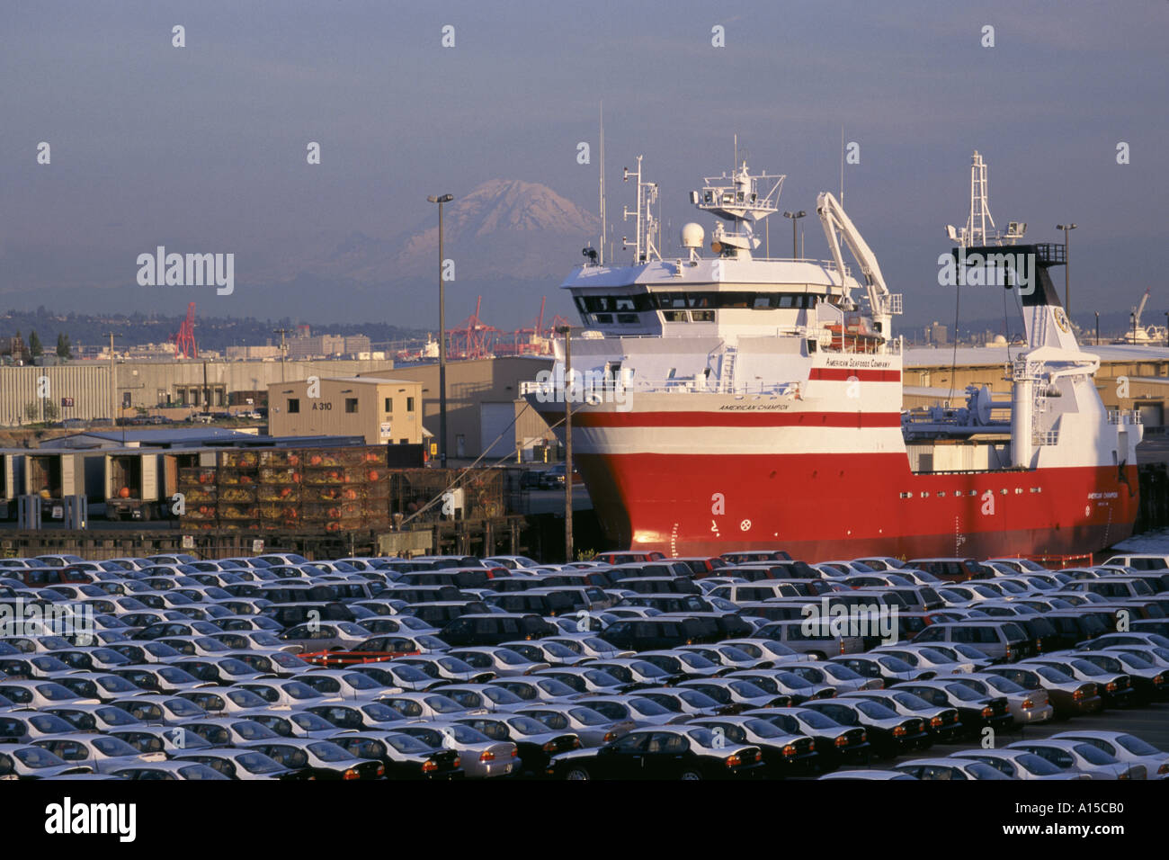 Lines Of Imported New Cars On Dock With Commercial Fishing Boat And ...