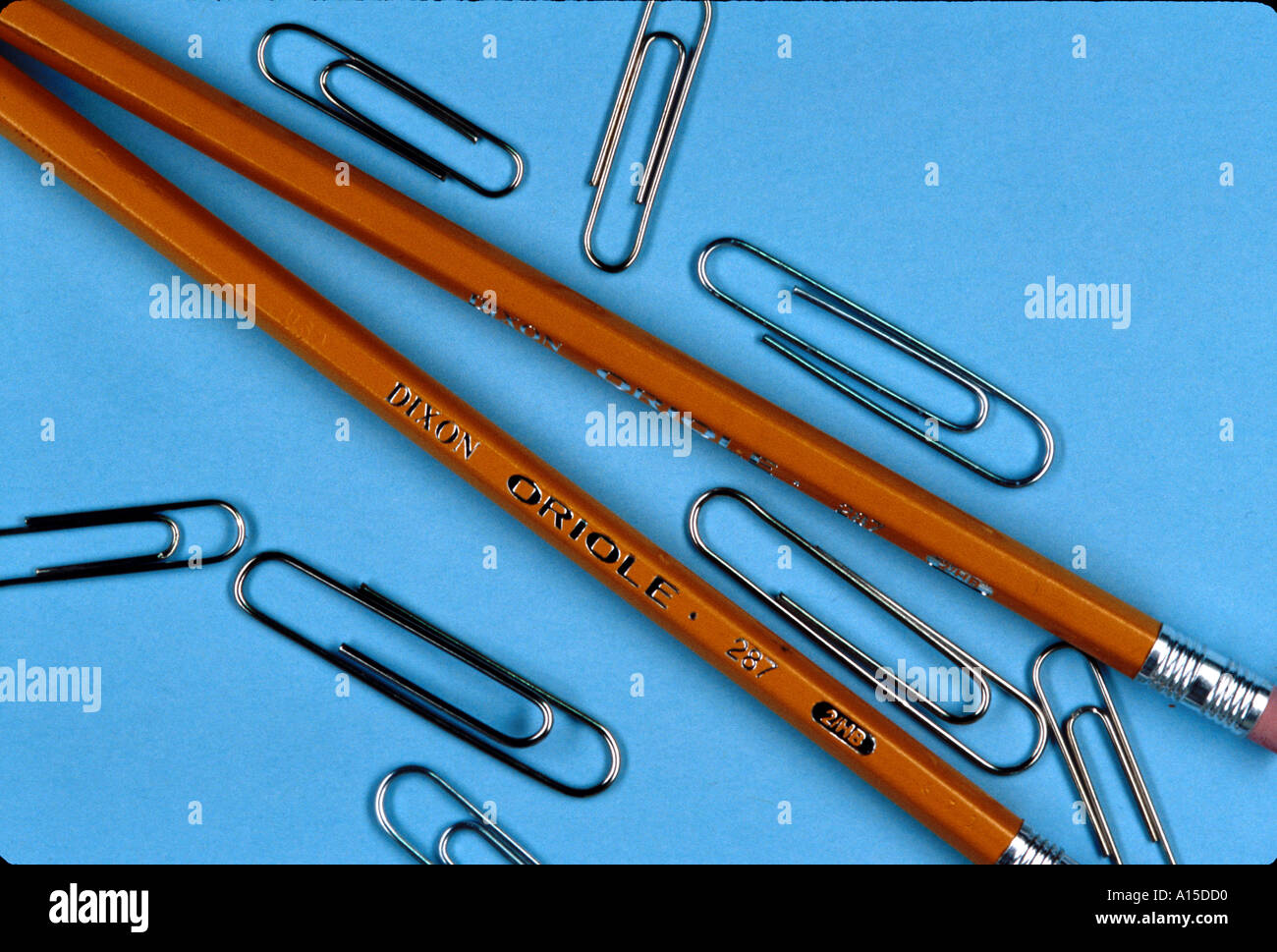 TWO PENCILS AND PAPER CLIPS Stock Photo - Alamy