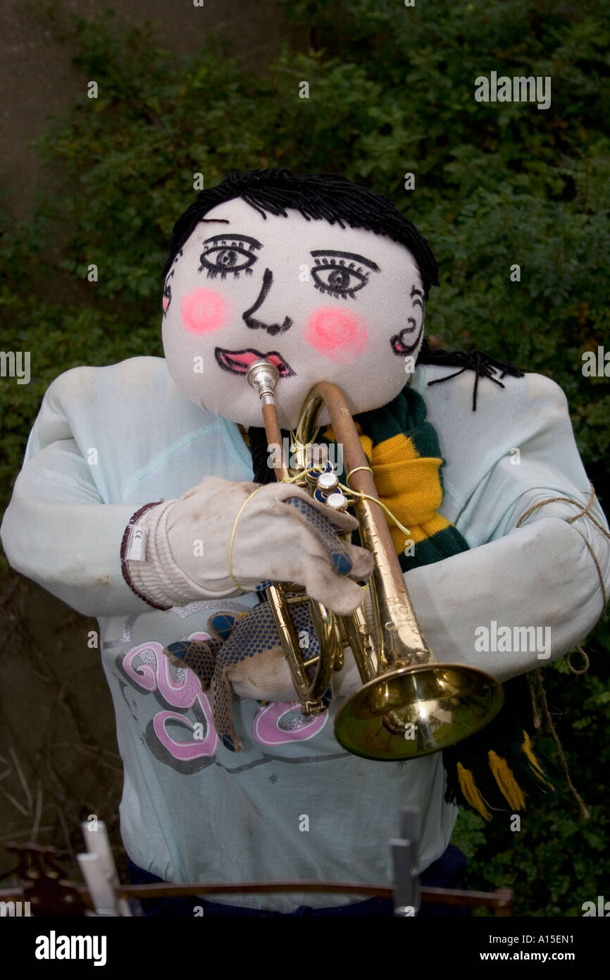 Scarecrow playing the trumpet Stock Photo - Alamy