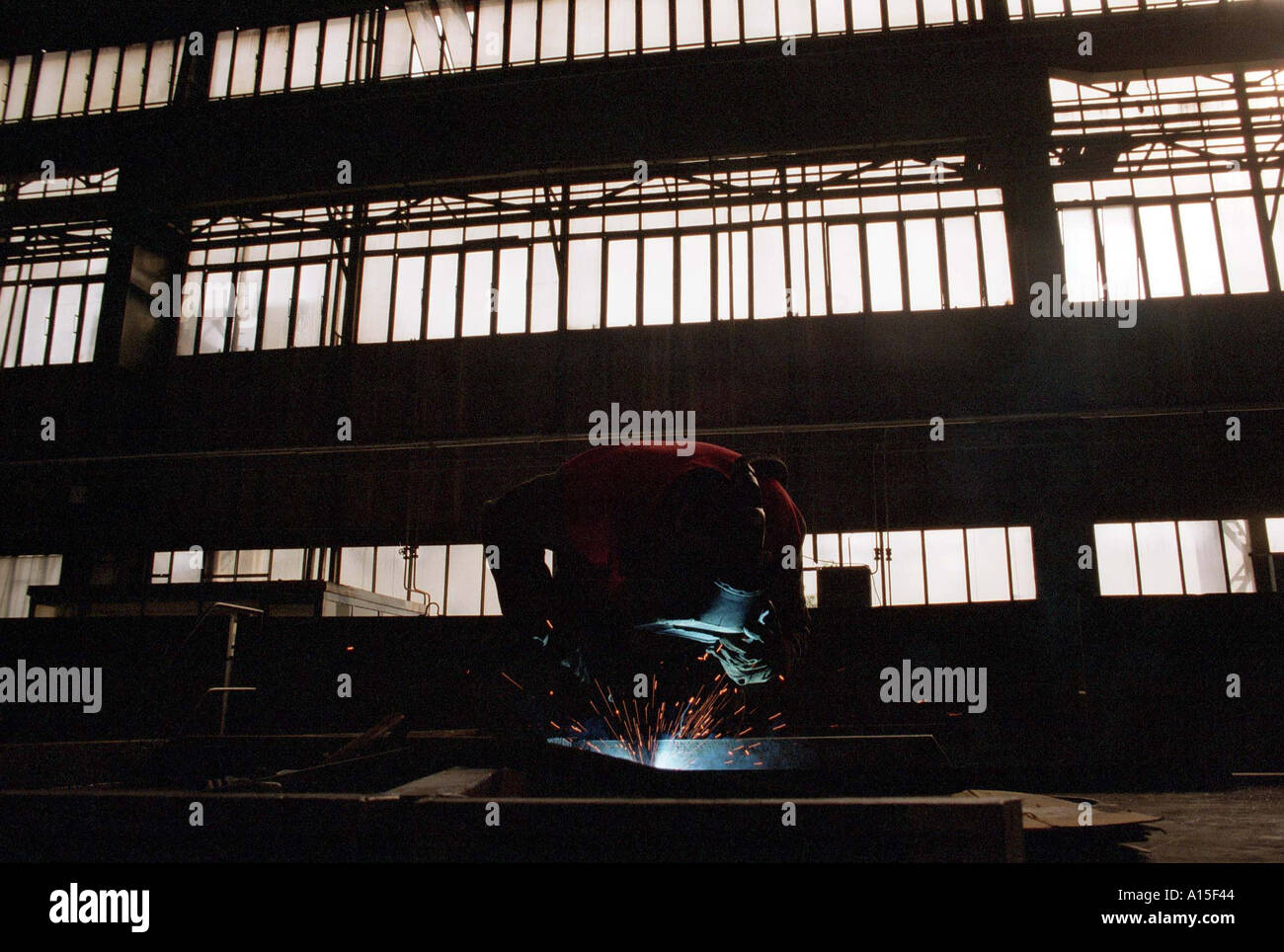 A worker welds machinery at the Vitkovice Engineering factory in ...